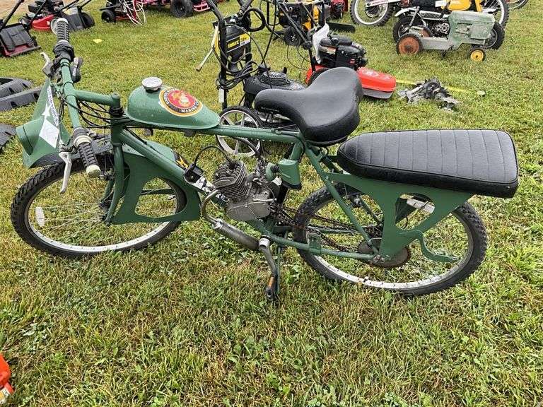 Motorized bicycle, turns over - Legacy Auction Company