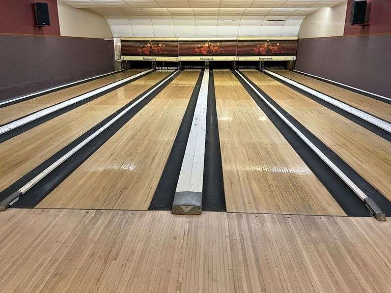2 Brunswick automatic pinsetters and two lanes - Legacy Auction Company