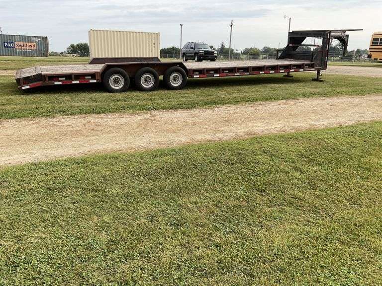 2001 36 x 8’ PJ trailer. Gooseneck triple axle - Legacy Auction Company