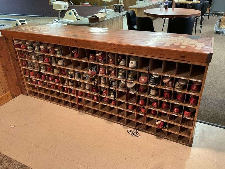 Bowling shoes, shoe rack and counter, buyer - Legacy Auction Company
