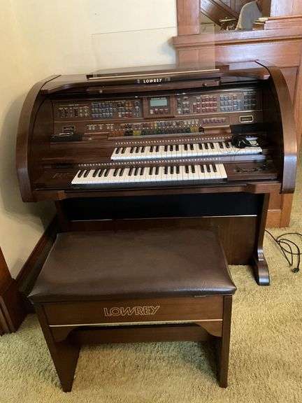 Lowrey Legacy electric organ 46" wide x 44" tall - Legacy Auction Company