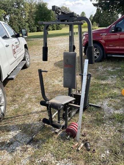 Weider 8510 weight machine with extra weights and - Legacy Auction Company