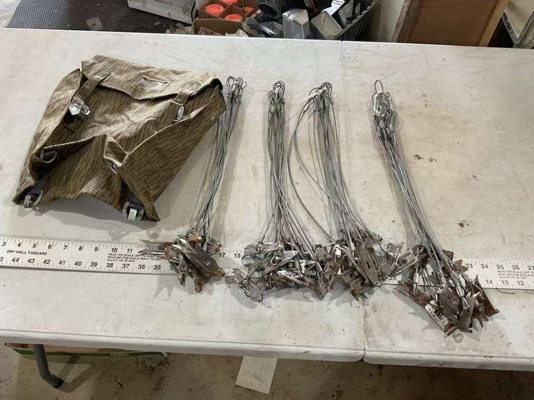 Snares and bag with mole trap - Legacy Auction Company