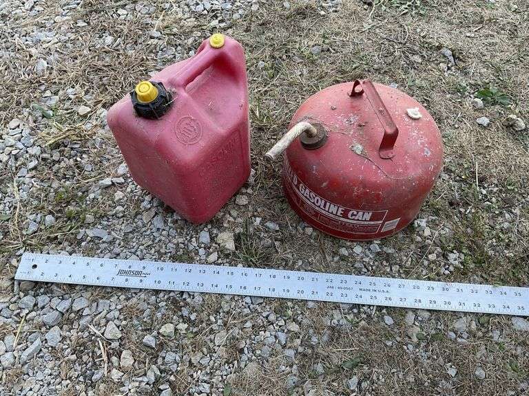 2- gas cans - Legacy Auction Company