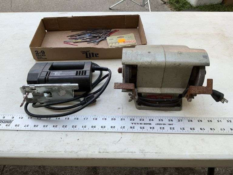 Black & Decker jigsaw and Dunlap 4" bench grinder - Legacy Auction Company