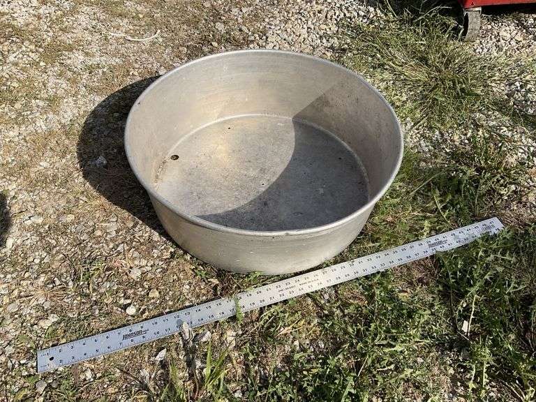 Aluminum tank with holes - Legacy Auction Company
