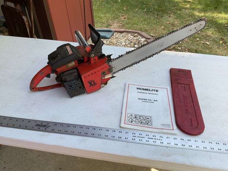 Homelite super XL chainsaw, runs - Legacy Auction Company