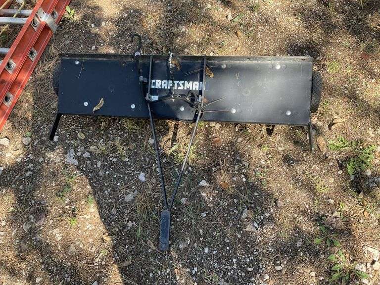 42" Craftsman pull behind thatcher - Legacy Auction Company