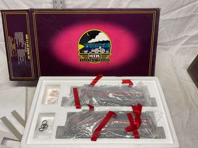 MTH Electric trains. 2 Rock Island locomotives. - Legacy Auction Company