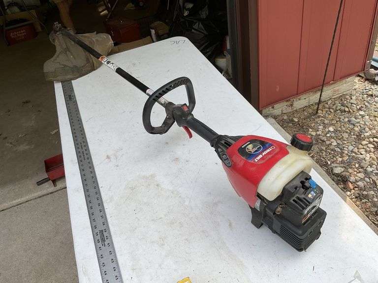 Troy Bilt string trimmer, engine loose - Legacy Auction Company
