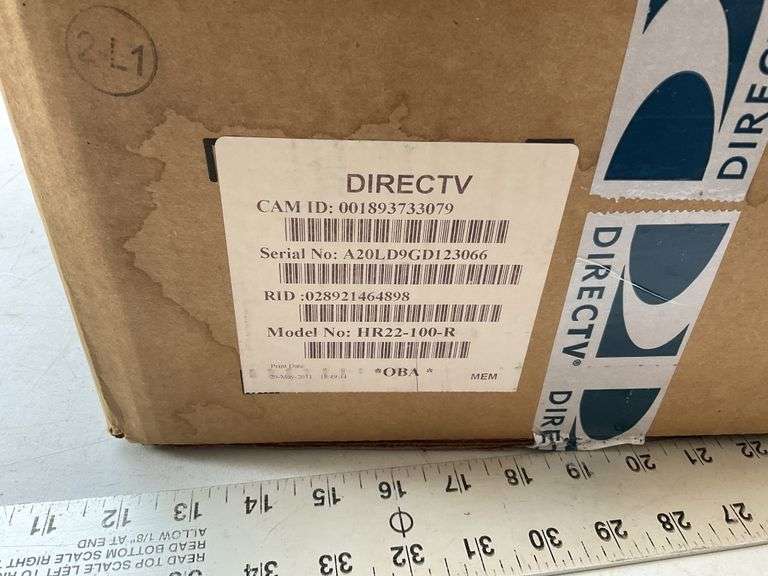 DIRECTV receiver boxes and JVC video cassette - Legacy Auction Company