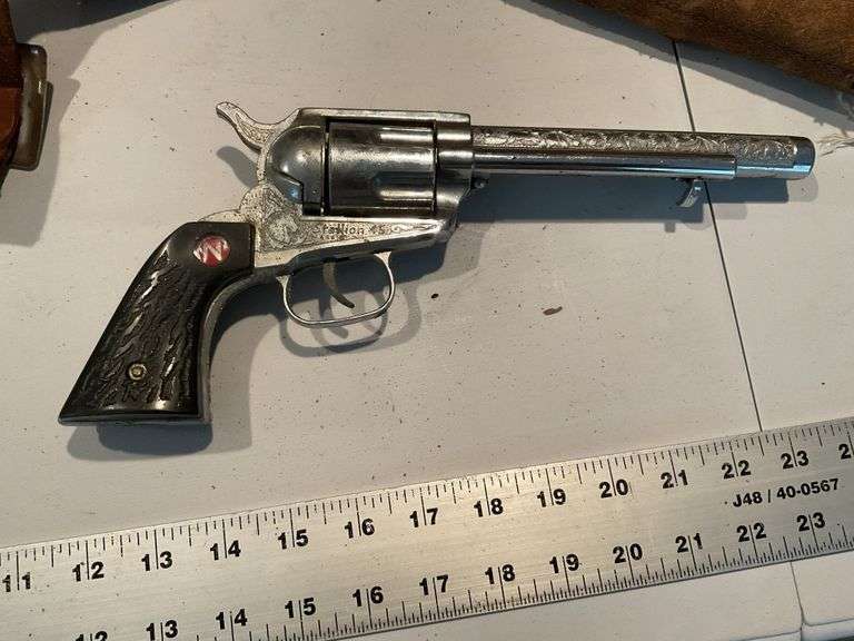 Vintage Nichols Stallion 45 cap gun - Legacy Auction Company