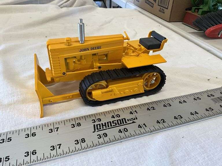 John Deere spec cast dozer - Legacy Auction Company