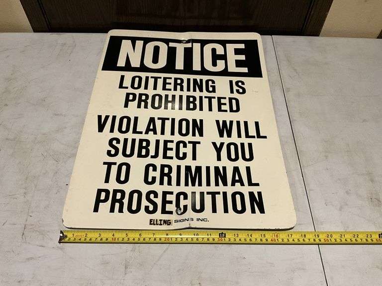 Metal "Loitering is Prohibited" sign - Legacy Auction Company