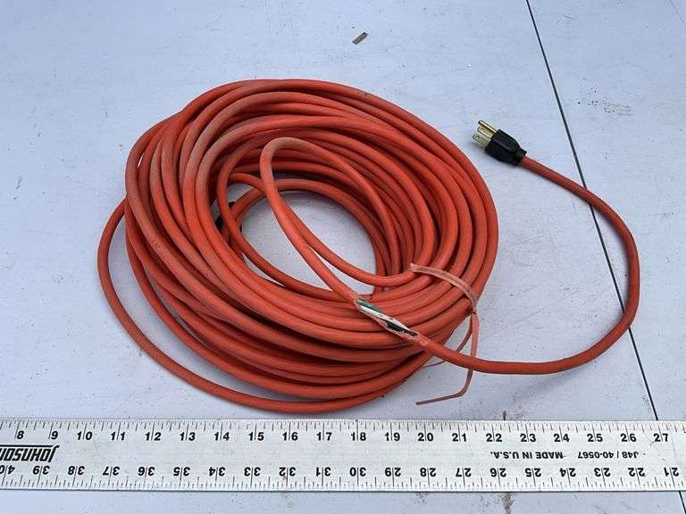 10 amp drop cord with some damage - Legacy Auction Company