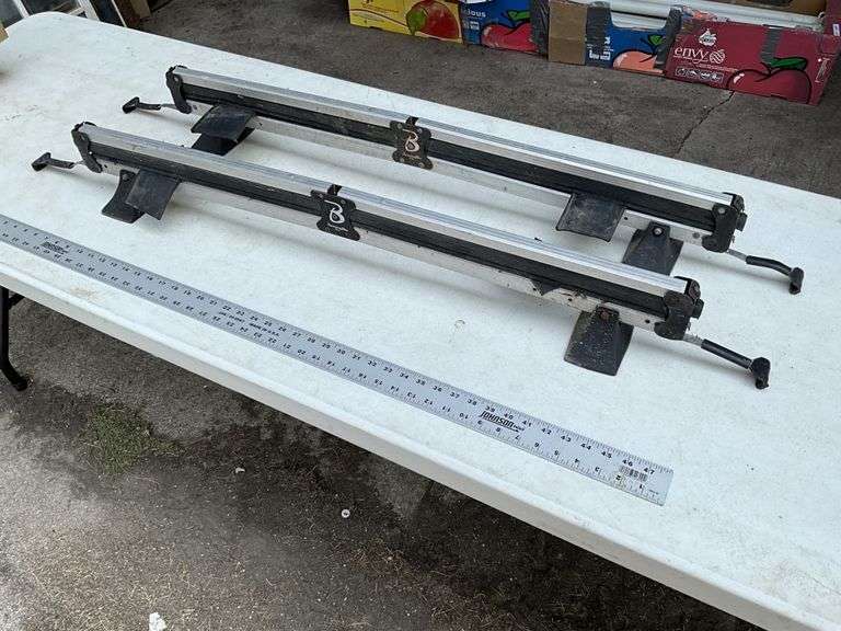Rooftop ski racks - Legacy Auction Company