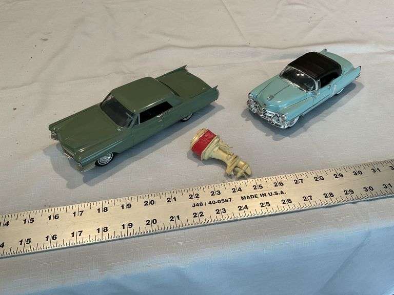 Vintage plastic wind up car, boat motor and - Legacy Auction Company