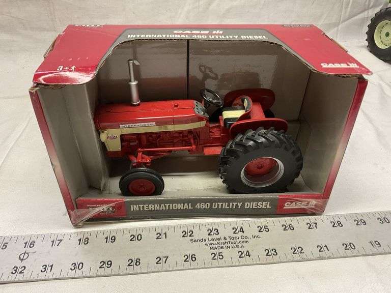 Ertl case I H 460 utility diesel tractor - Legacy Auction Company