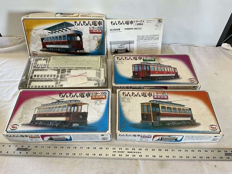 Model trolley cars - Legacy Auction Company