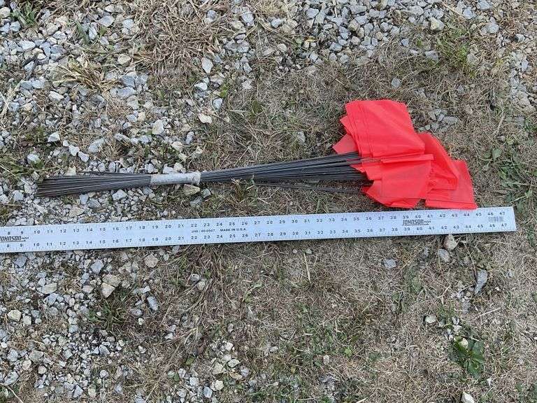 Orange marker flags - Legacy Auction Company