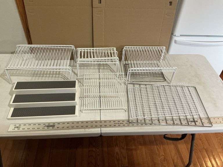 Assorted spice racks/storage racks - Legacy Auction Company