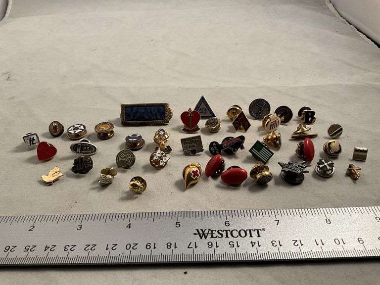 Tac pins - Legacy Auction Company