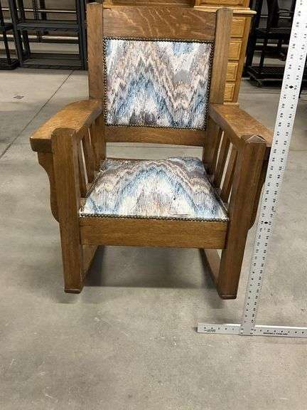 Quarter sawn oak rocker. Needs seat repaired. - Legacy Auction Company