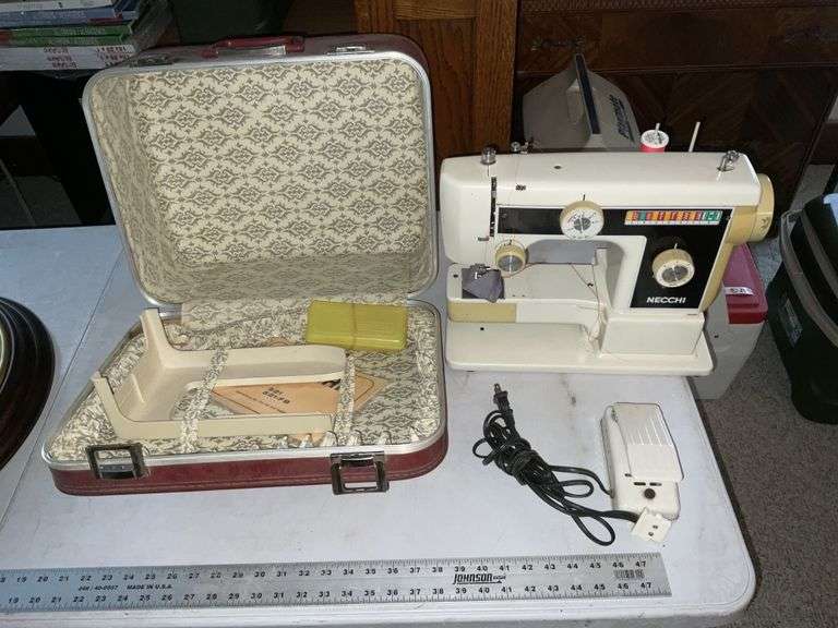 Necchi portable sewing machine - Legacy Auction Company