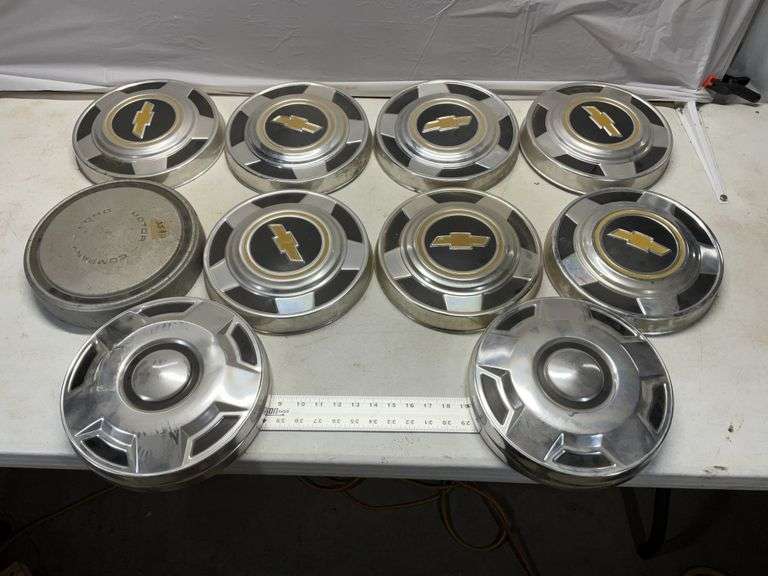 Chevy/Ford hubcaps - Legacy Auction Company