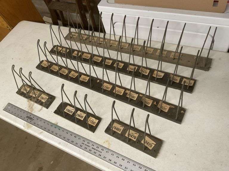 Vintage automotive belt racking - Legacy Auction Company