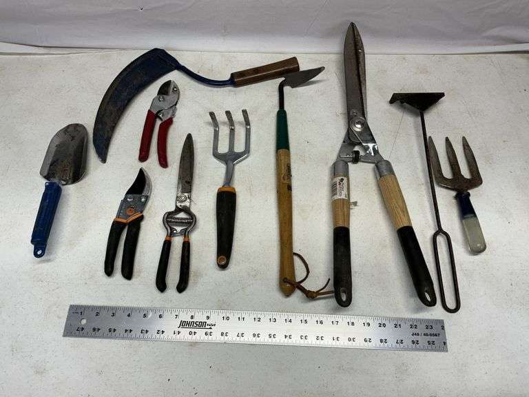 Assorted garden tools - Legacy Auction Company