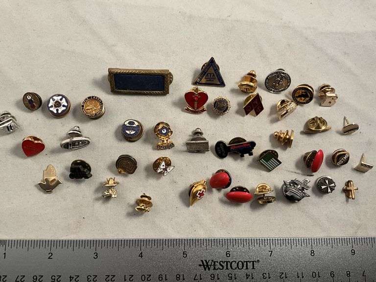 Tac pins - Legacy Auction Company