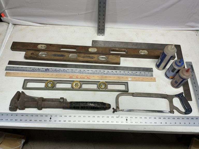 Monkey wrench/hacksaw/levels - Legacy Auction Company
