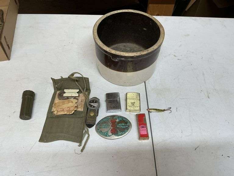 Crock, Army kit, belt buckle, lighters, etc - Legacy Auction Company
