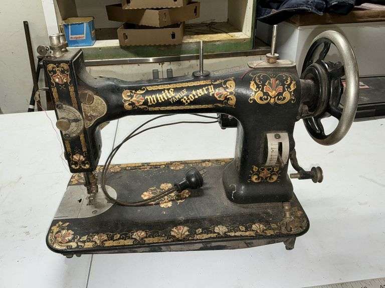 Antique White rotary sewing machine - Legacy Auction Company