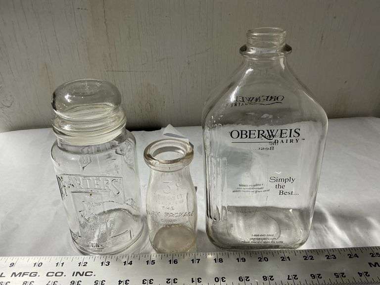 Planters peanut jar, pint bottle and Oberweis - Legacy Auction Company