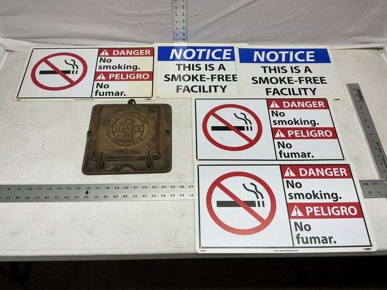 Plastic No Smoking signs and hayes stove door - Legacy Auction Company
