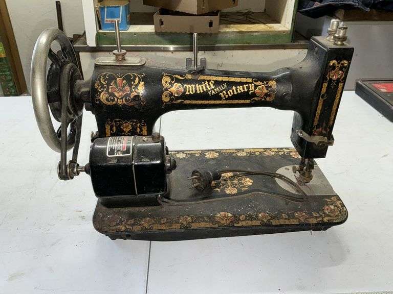 Antique White rotary sewing machine - Legacy Auction Company