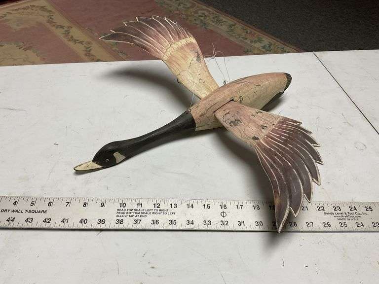 Hanging wooden goose - Legacy Auction Company