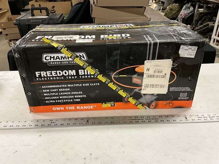 Champion electronic trap thrower. New inbox. - Legacy Auction Company