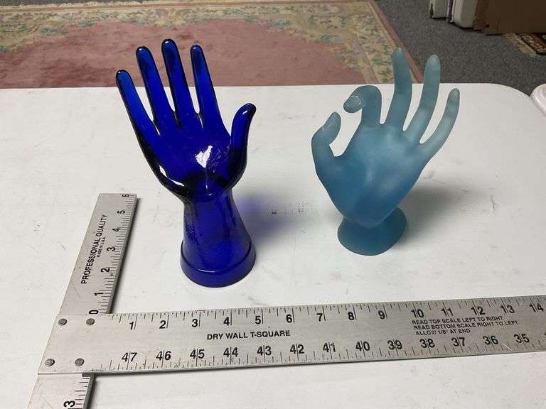 2- glass display hands - Legacy Auction Company