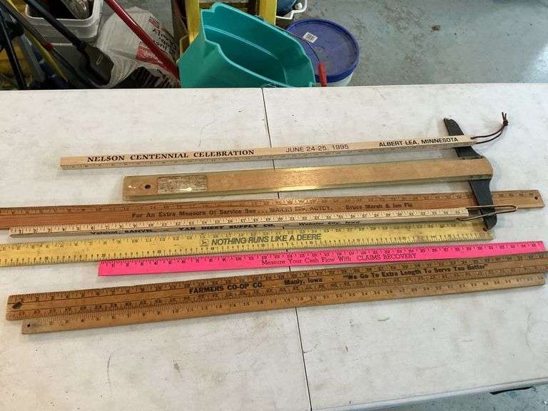 Measuring sticks - Legacy Auction Company