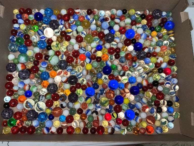 1- box of marbles - Legacy Auction Company
