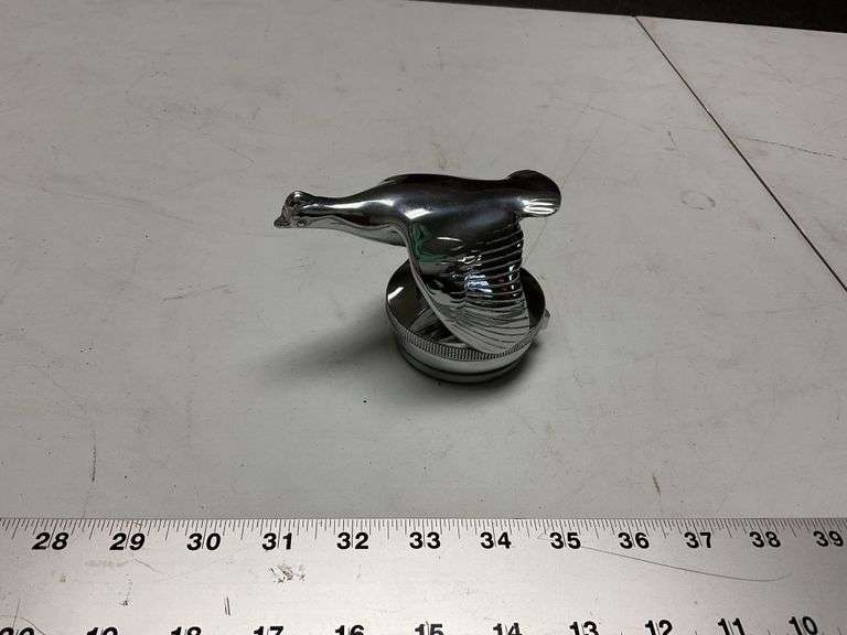 Model A Ford flying quail radiator cap - Legacy Auction Company