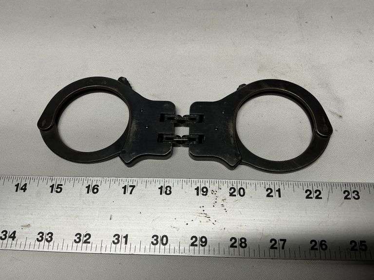 Vintage Peerless handcuffs (no key) - Legacy Auction Company