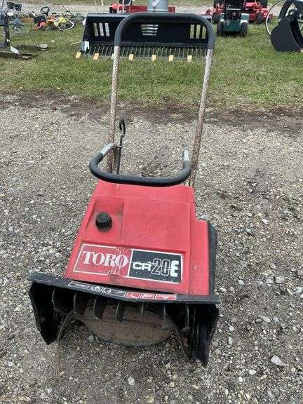 Toro CR20E snow thrower - Legacy Auction Company