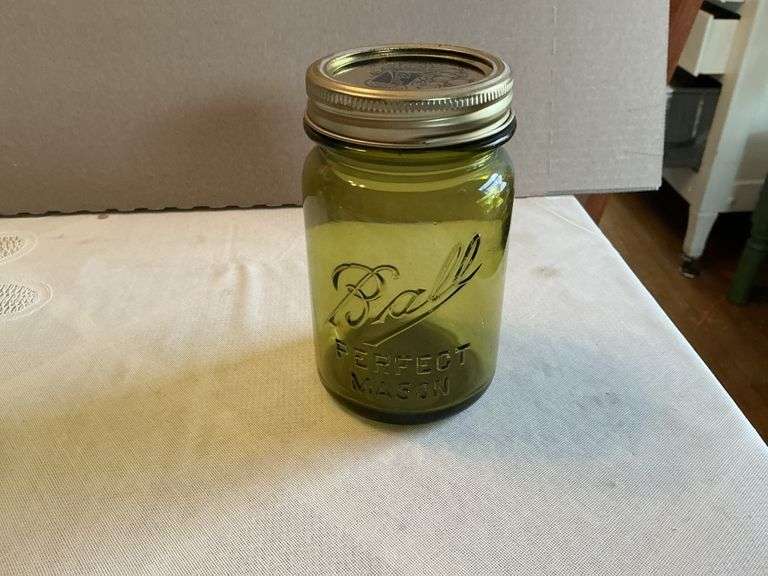 Olive green Ball pint jar - Legacy Auction Company
