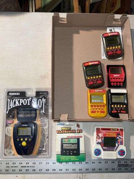 Vintage 90's handheld electronic games - Legacy Auction Company