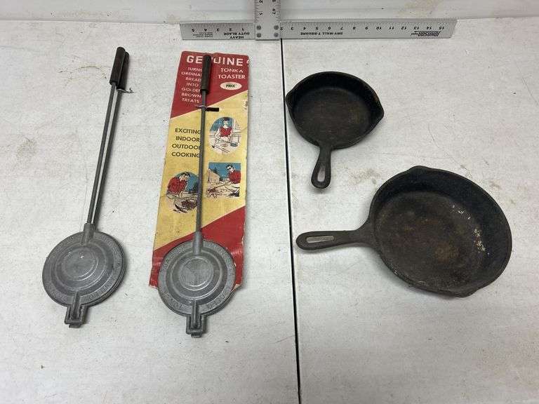 Cast iron skillets/Tonka toasters - Legacy Auction Company