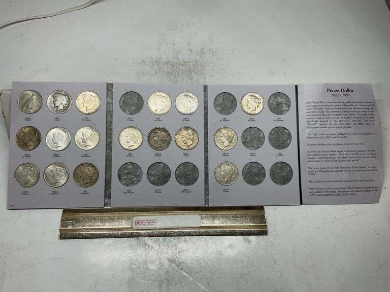 Peace silver dollar book 1921–35 - Legacy Auction Company